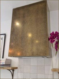 Kitchen Extractors and cooker hoods in brass and metal