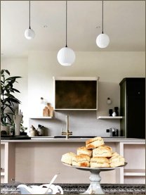 Kitchen Extractors and cooker hoods in brass and metal